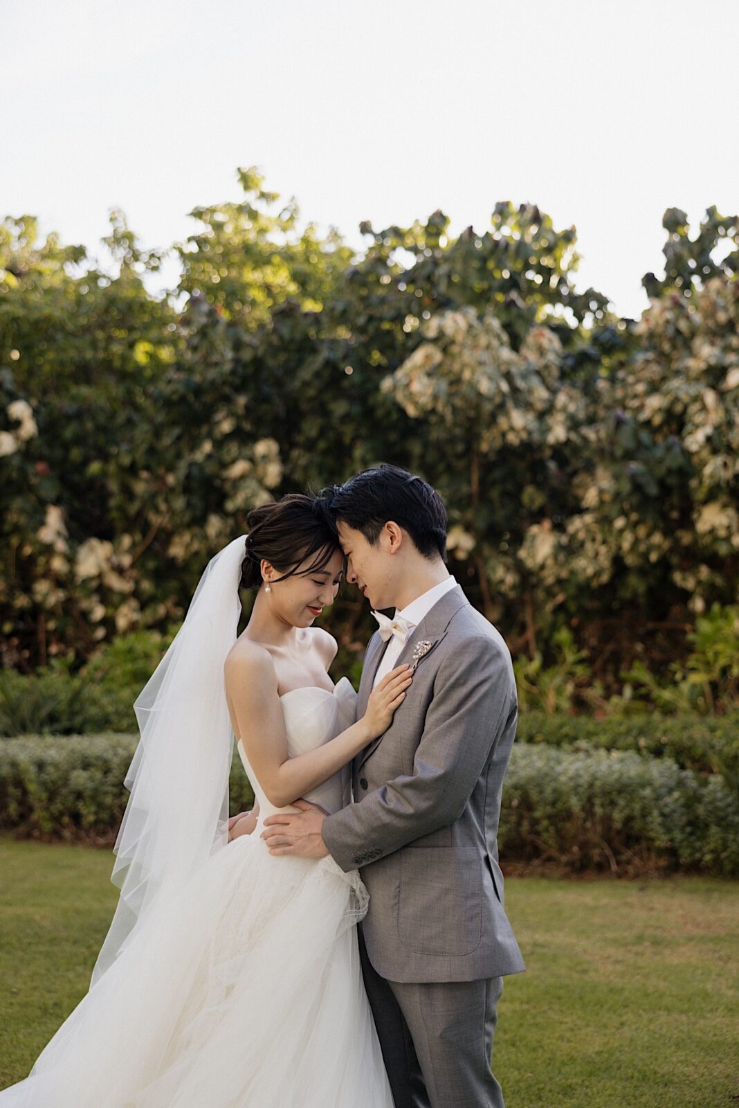 Sunset Elopement at the Four Seasons Oahu | Jiaye + Shuxiao - Mersadi Olson Wedding Photography